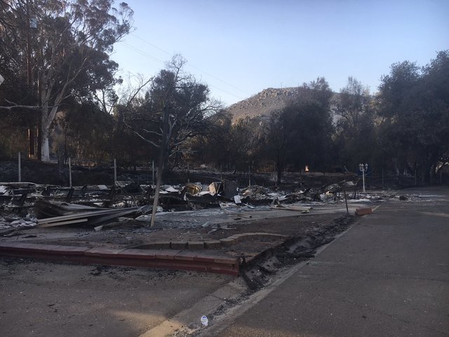 West Fire burns hundreds of acres, destroys several structures in ...