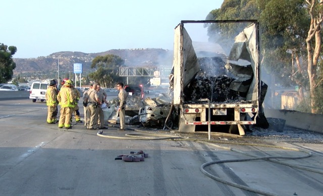 One killed in fiery crash on I-8 involving a car wedged under a truck ...