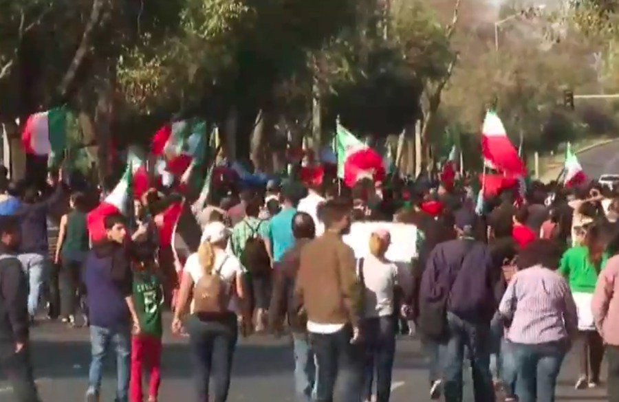 Tijuana residents protest migrant caravan camped in city - 10News.com ...